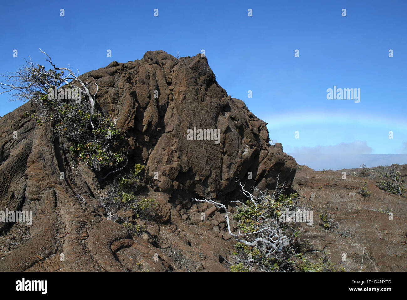 Rainbow over Old lava flow Kilauea Volcanoes National Park Hawaii the ...