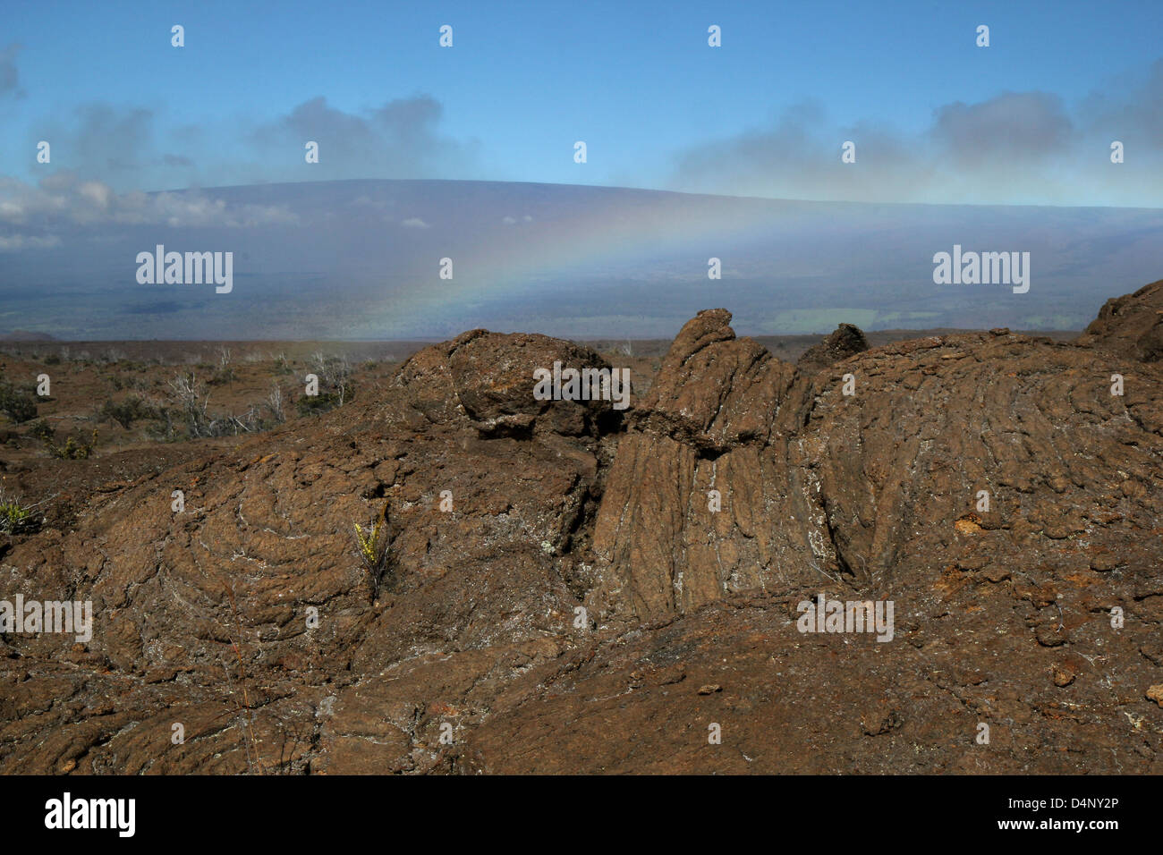 Mauna Loa volcano with Rainbow over old lava flow Kilauea Volcanoes ...