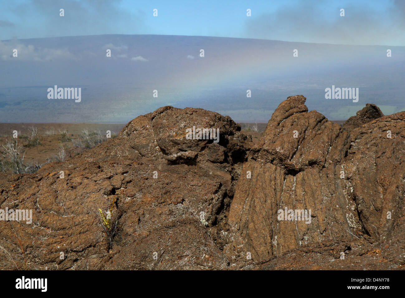 Mauna Loa volcano with Rainbow over old lava flow Kilauea Volcanoes ...