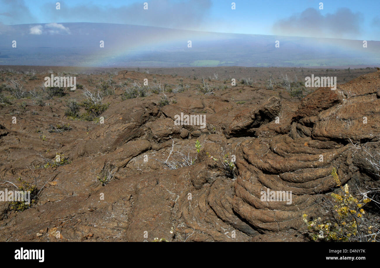 Mauna Loa volcano with Rainbow over old lava flow Kilauea Volcanoes ...