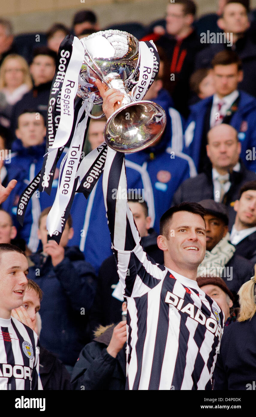 Glasgow, UK. 17th March, 2013. Steven Thompson lifts the Cup, Scottish ...
