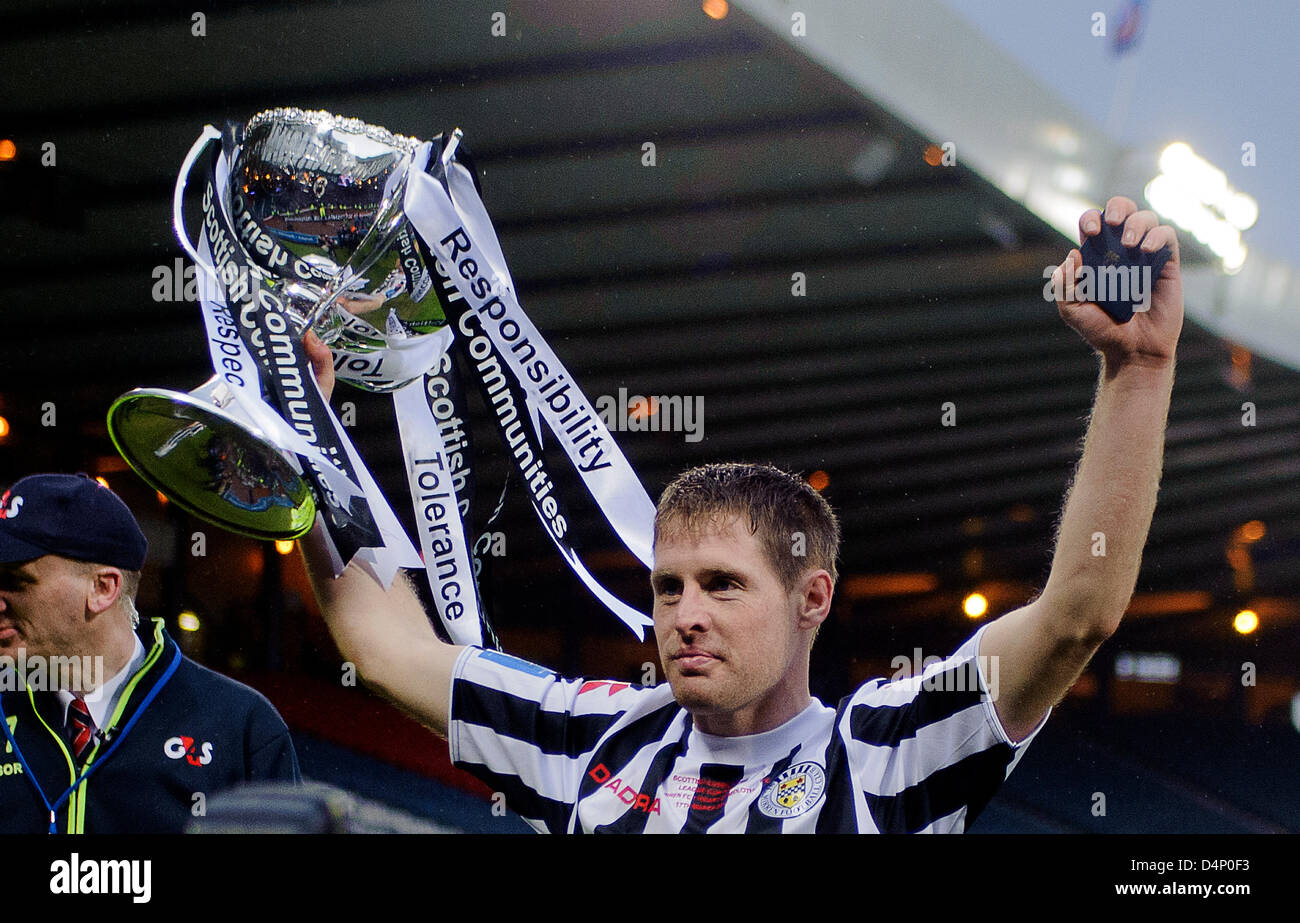 Glasgow, UK. 17th March, 2013. David van Zanten raises the cup ...