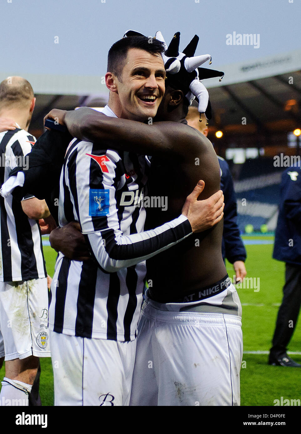 Glasgow, UK. 17th March, 2013. Steven Thompson is congratulated by ...