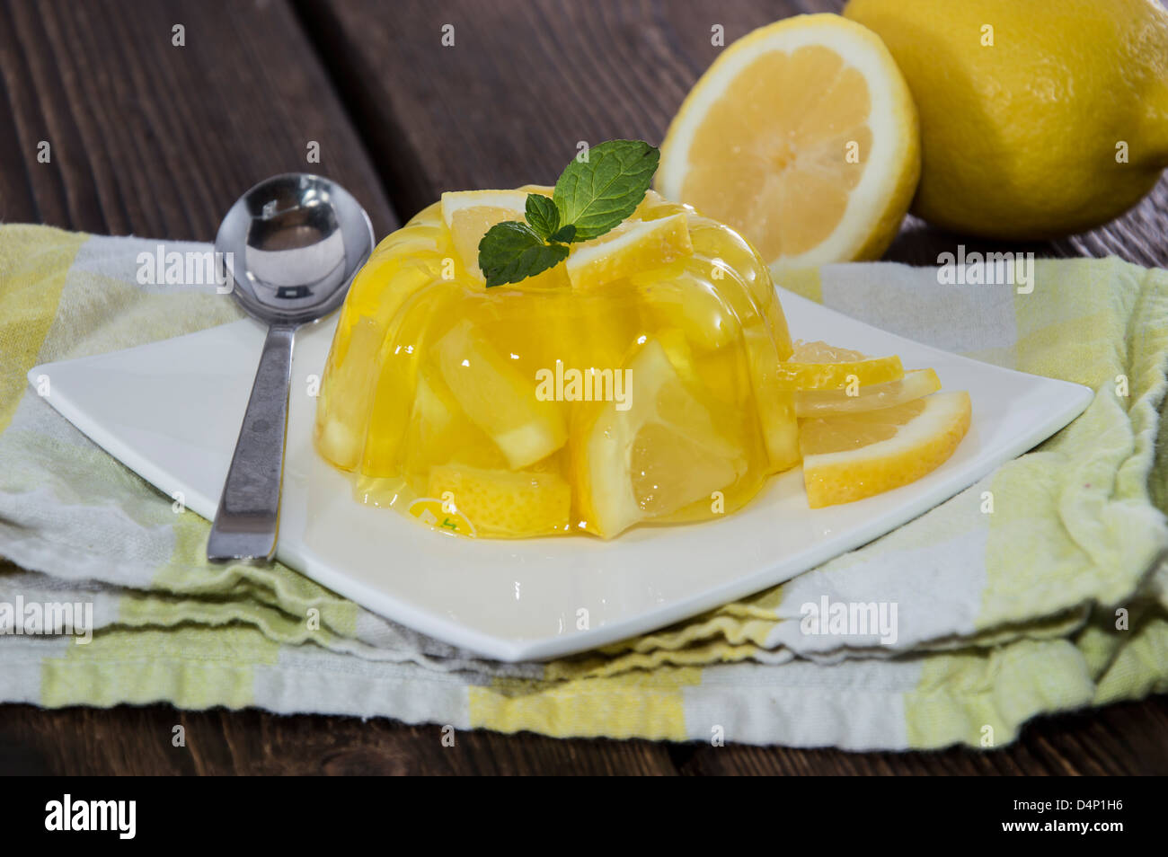 Portion of fresh made Lemon Jello Stock Photo - Alamy