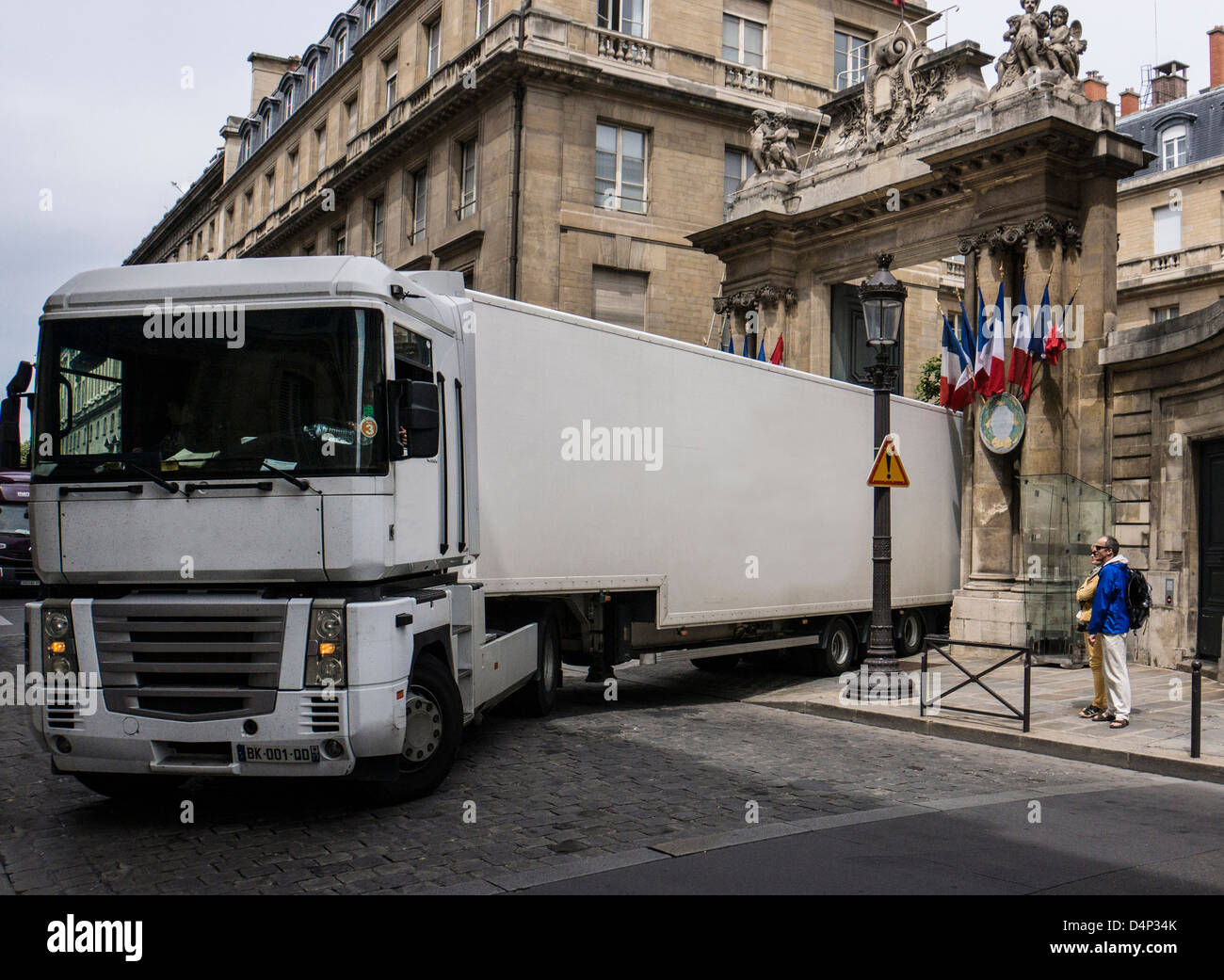 Trailer truck backing into the gate of the National Assembly in Paris ...