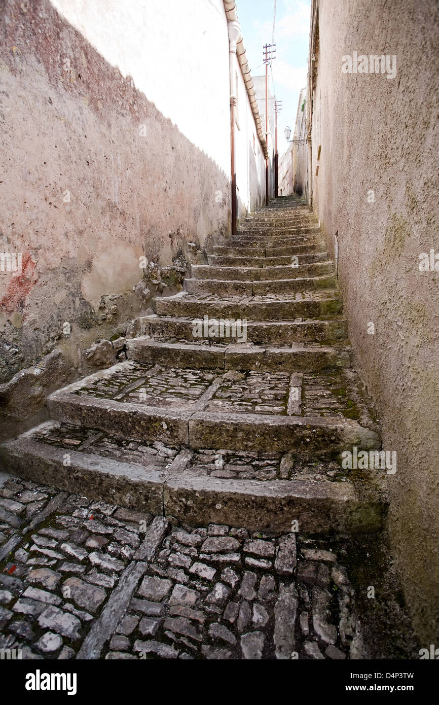 closeup medieval street with steps of stone stairway, Erice town ...