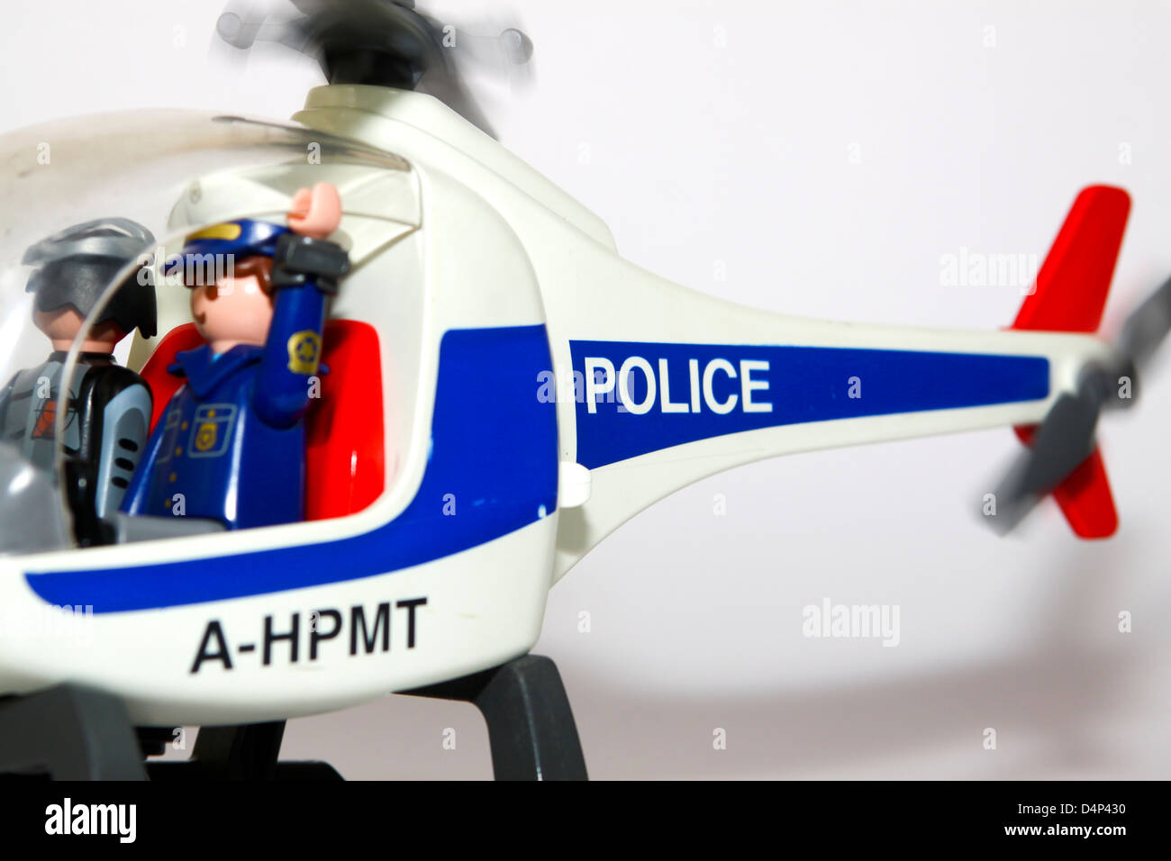 Plastic toy police helicopter Stock Photo - Alamy