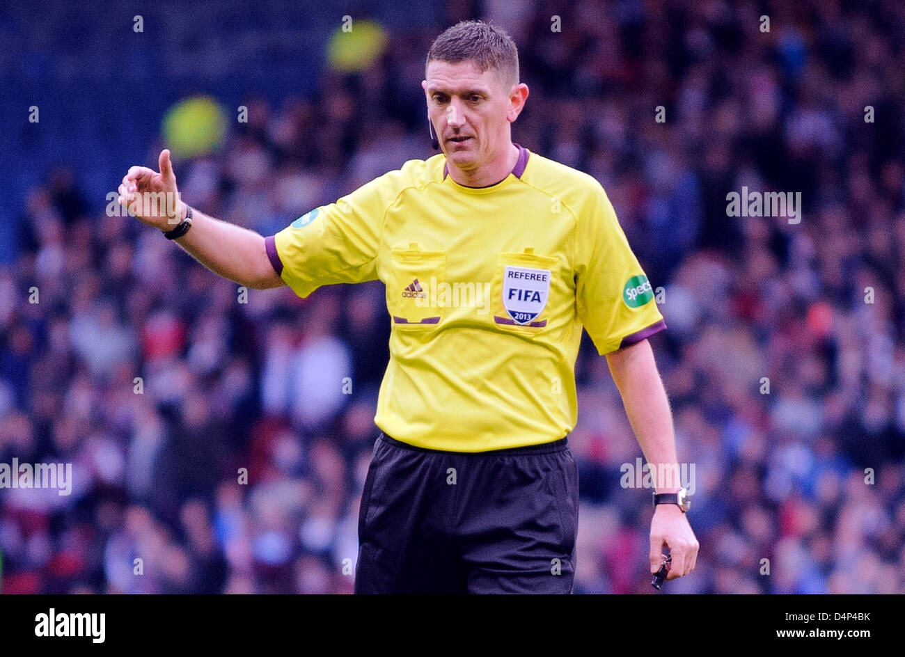 Glasgow, Scotland, UK. Sunday 17th March 2013. Referee Craig Thomson ...
