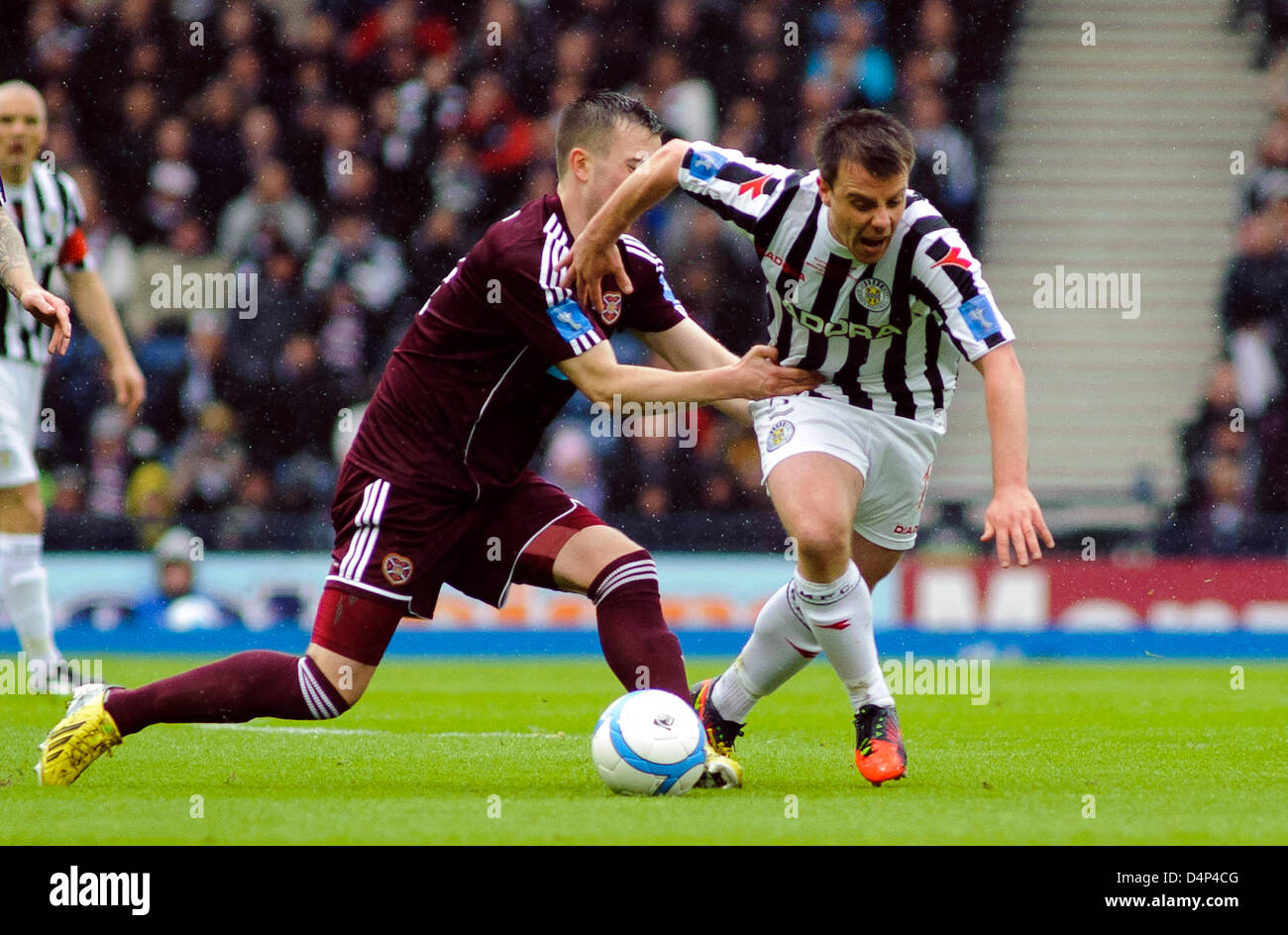 Glasgow, Scotland, UK. Sunday 17th March 2013. Danny Wilson gets a hold ...
