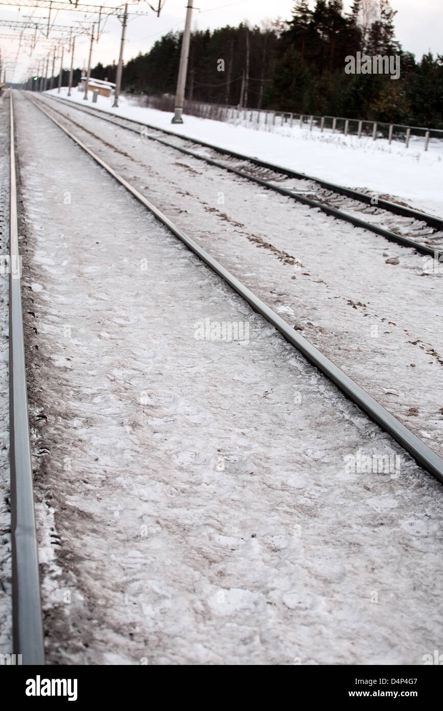 railway diagonal perspective closeup view at winter evening Stock Photo ...