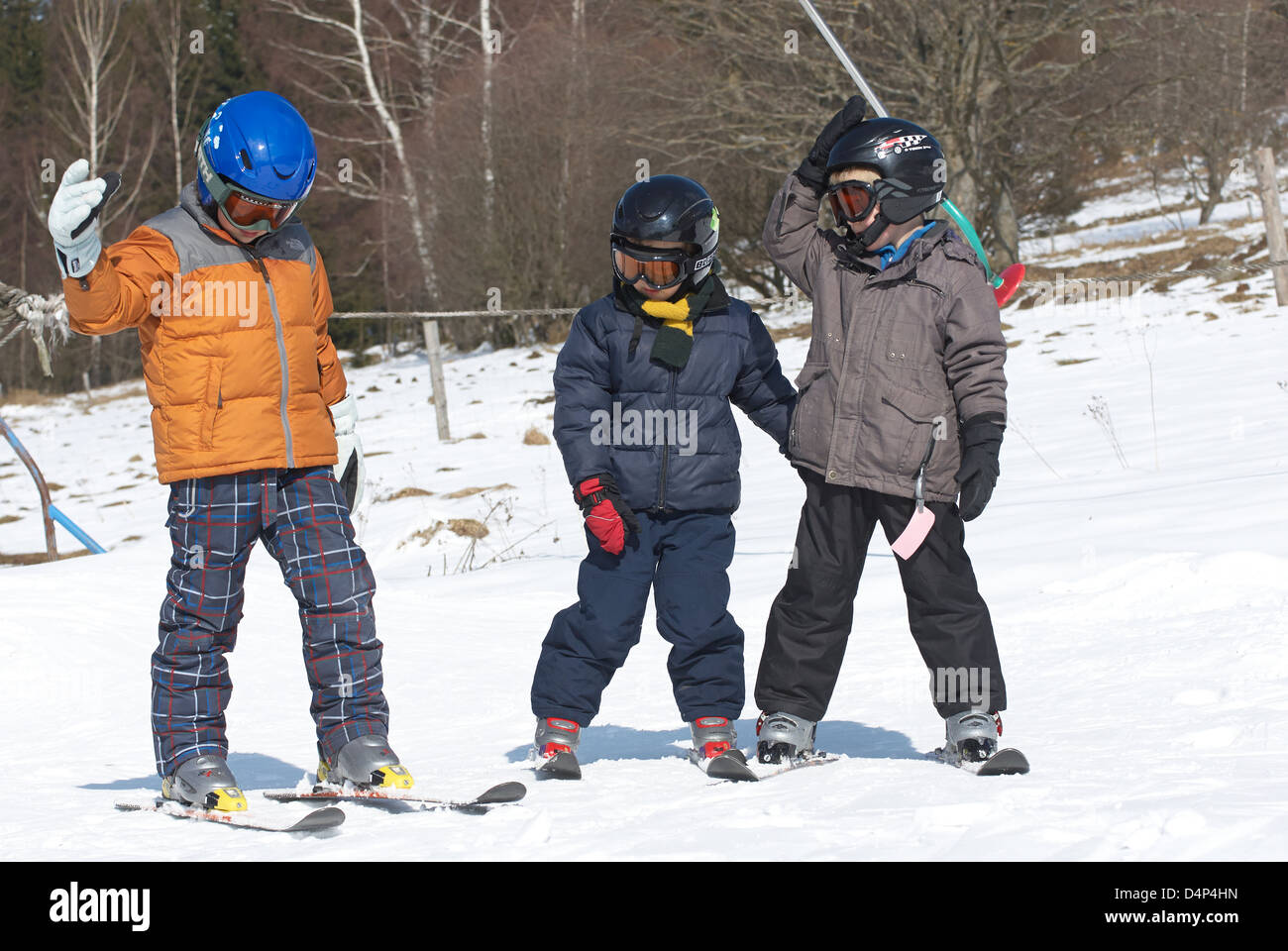 Children skiing at ski school, winter mountain Stock Photo - Alamy