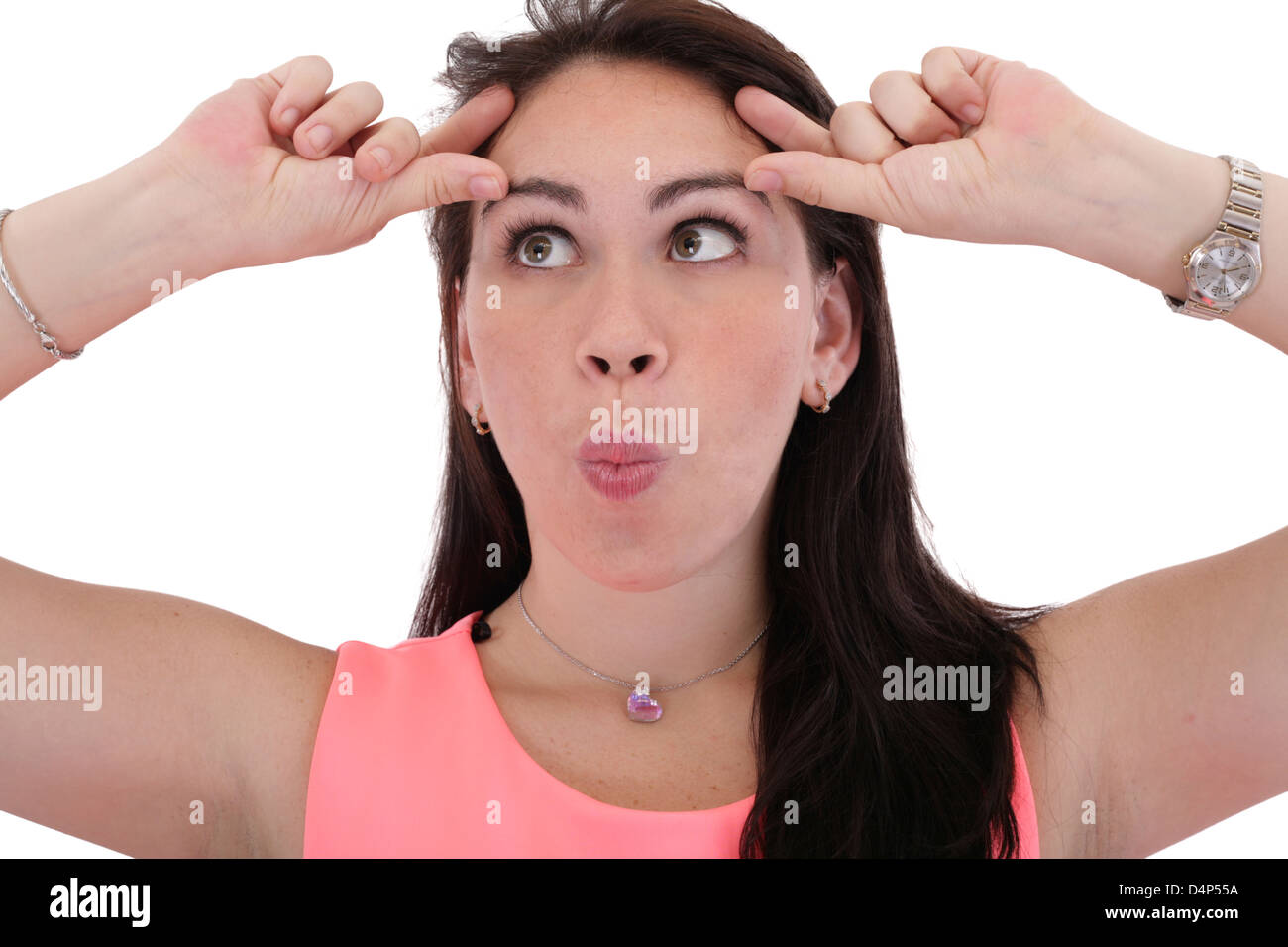 Portrait of a funny young woman looking up on isolated background Stock ...