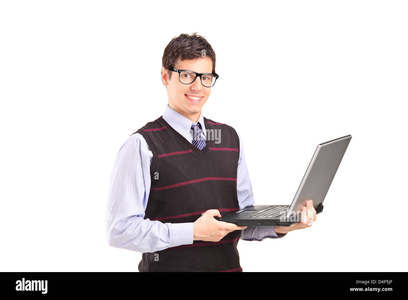 Professional young man holding a laptop isolated on white background ...