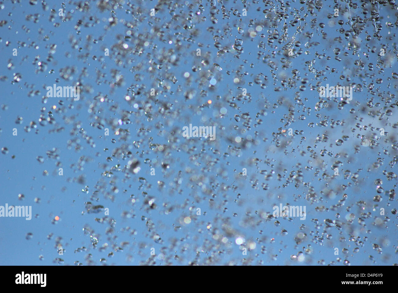 Blue water splashing on a backdrop hi-res stock photography and images ...