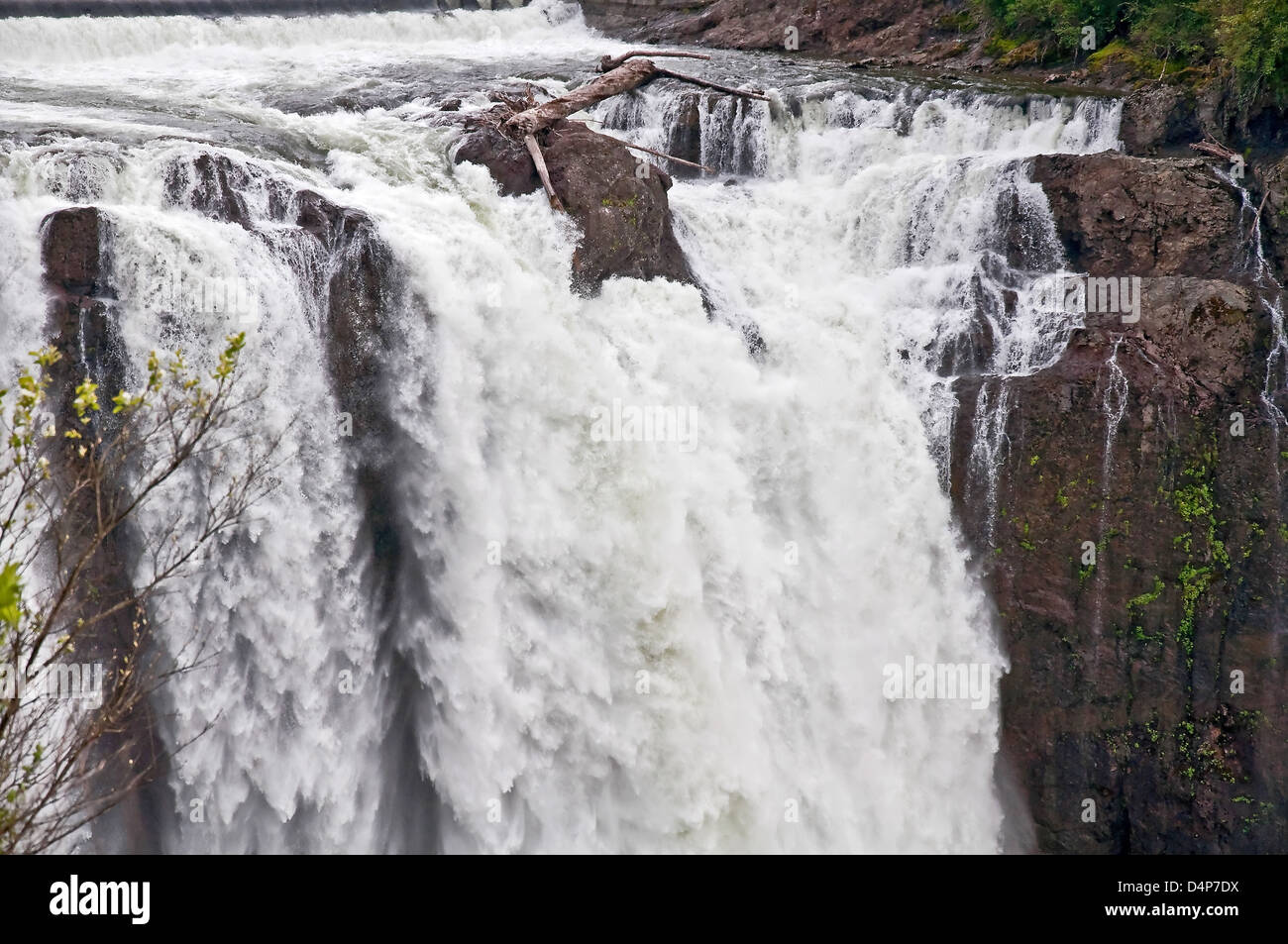 This nature image is the top of a large waterfall with the water ...