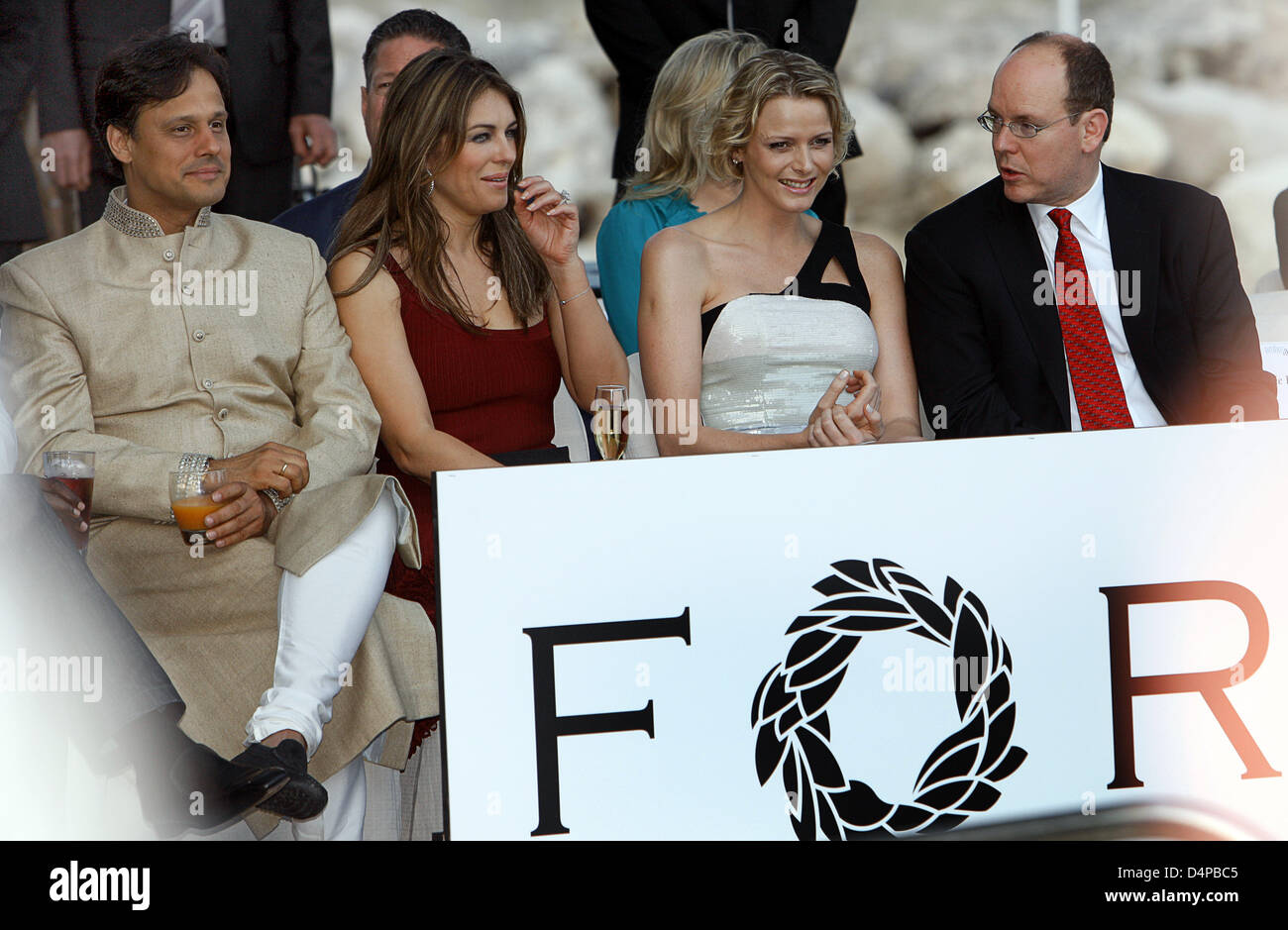 Elizabeth hurley and husband arun nayar hi-res stock photography and ...