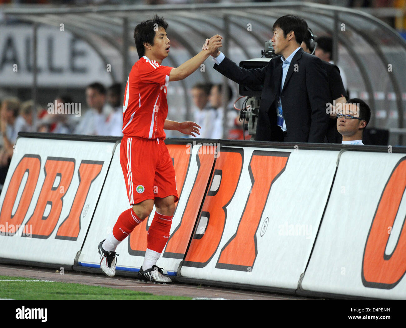 Chinese soccer coach hi-res stock photography and images - Alamy