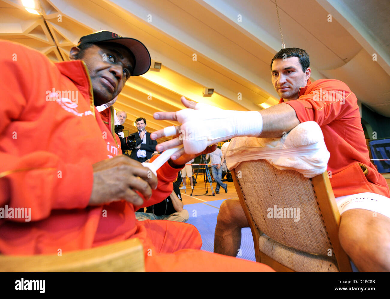 Coach Emanuel Steward (L) bandages the hands of Heavyweight World ...