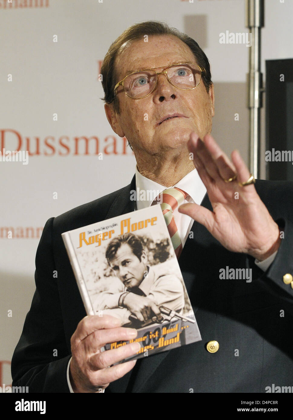 British actor and UNICEF ambassador Roger Moore presents his ...