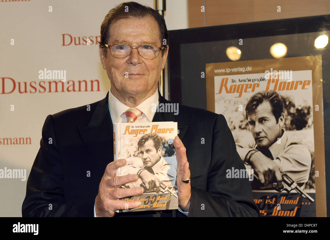 British actor and UNICEF ambassador Roger Moore presents his ...