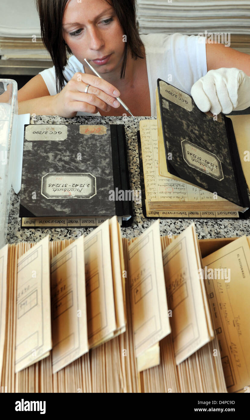 Susan Albrecht restores an original death book from the concentration ...