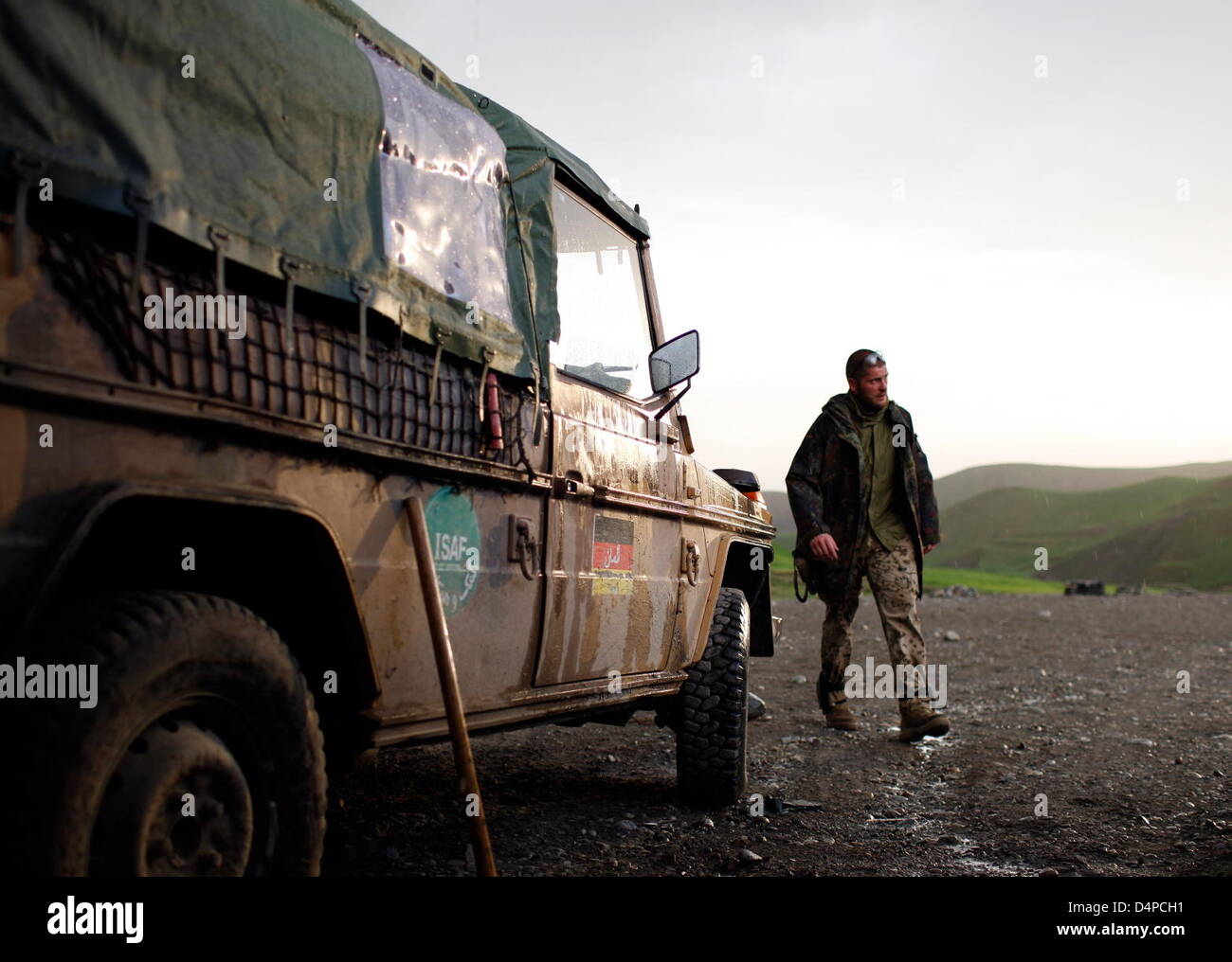 A German Bundeswehr soldier of the Mobile Operation Liaison Team MOLT 3 ...