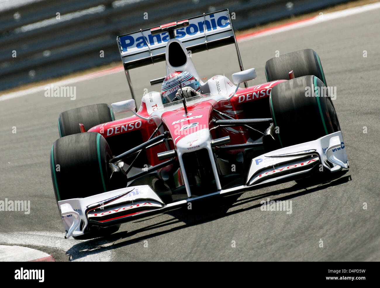 Italian Formula One driver Jarno Trulli of Toyota Racing steers his car ...
