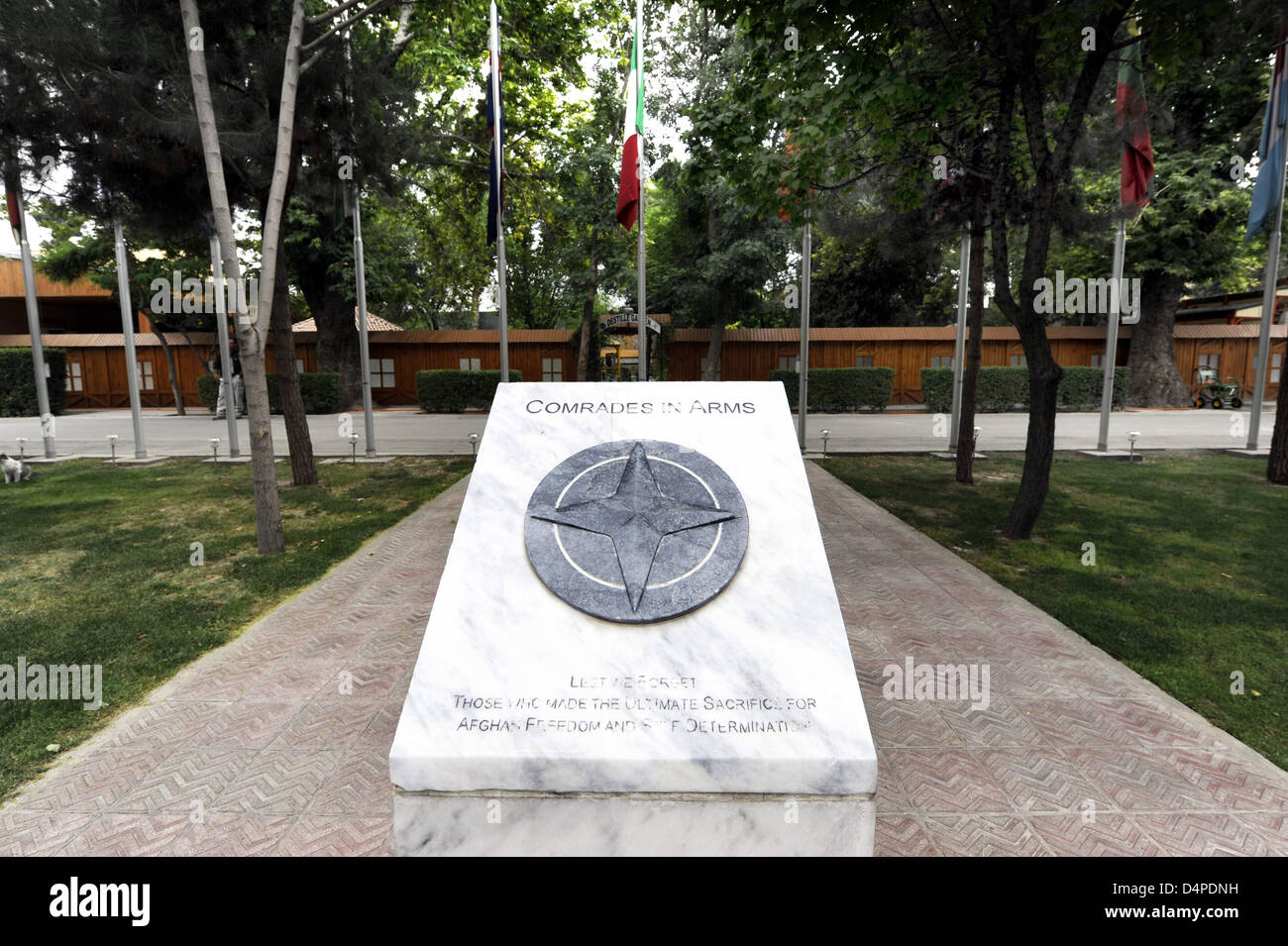 A marble memorial plate for ?Comrades in Arms? with the NATO compass ...
