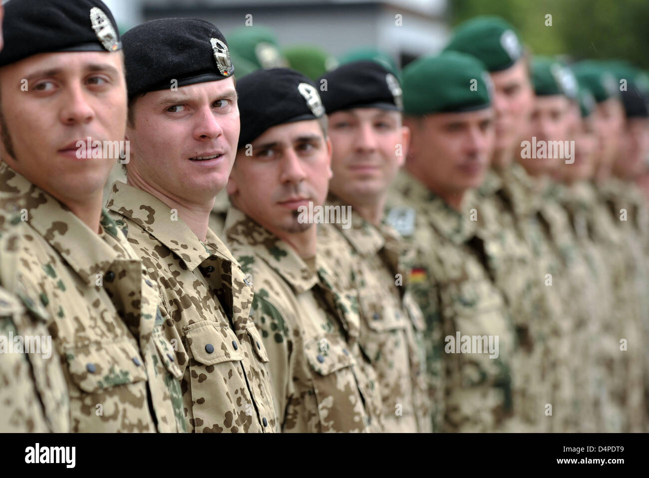 Bundeswehr (German armed forces) soldiers form up for their send-off to ...
