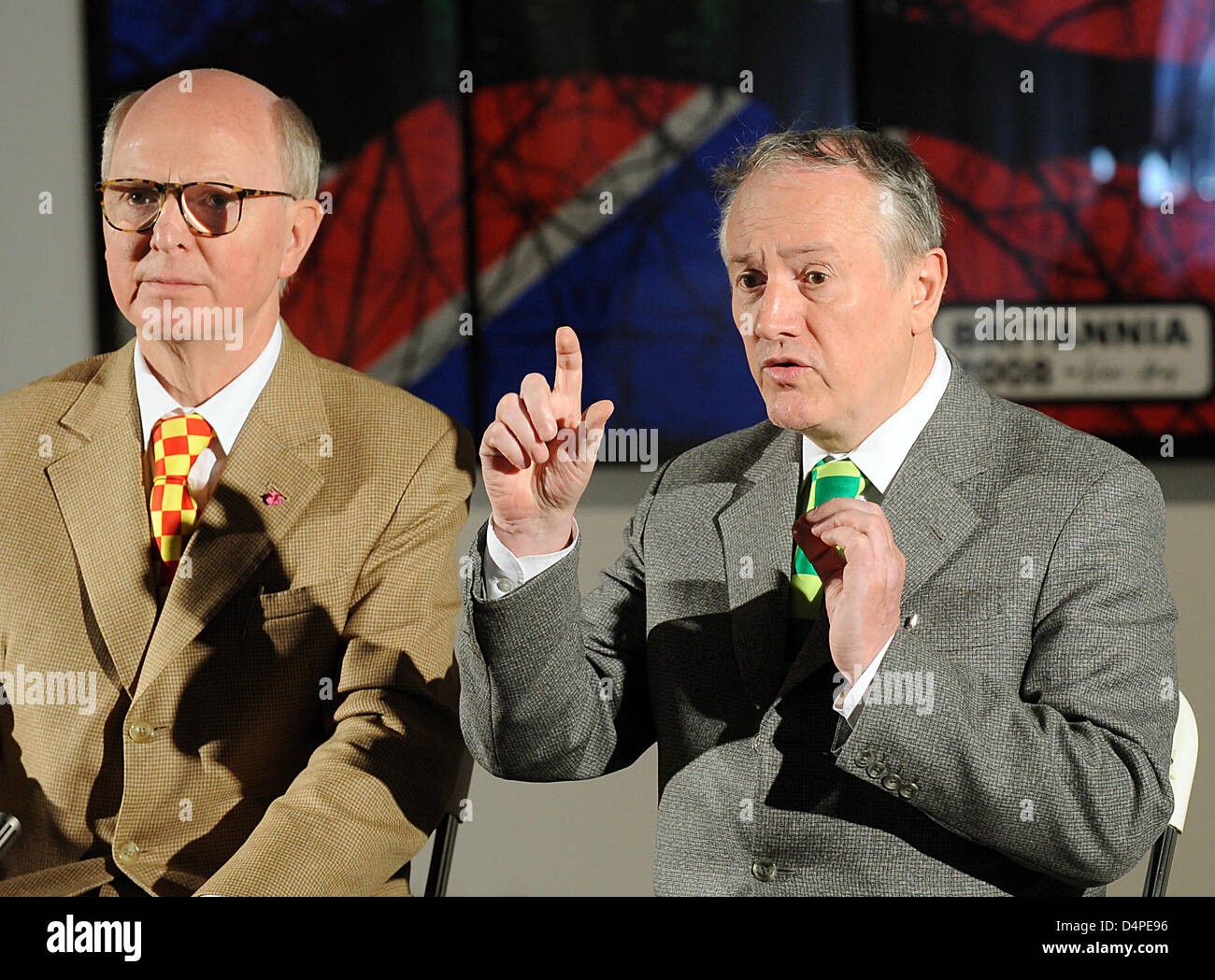 Artist duo George (L) and Gilbert (R) pictured in front of their work ...
