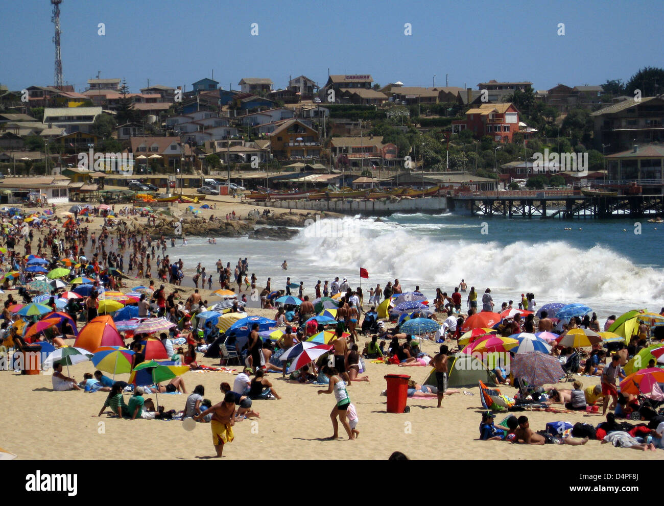 A crowded beach at the Pacific Ocean near Cartagena, Chile, 20 February ...