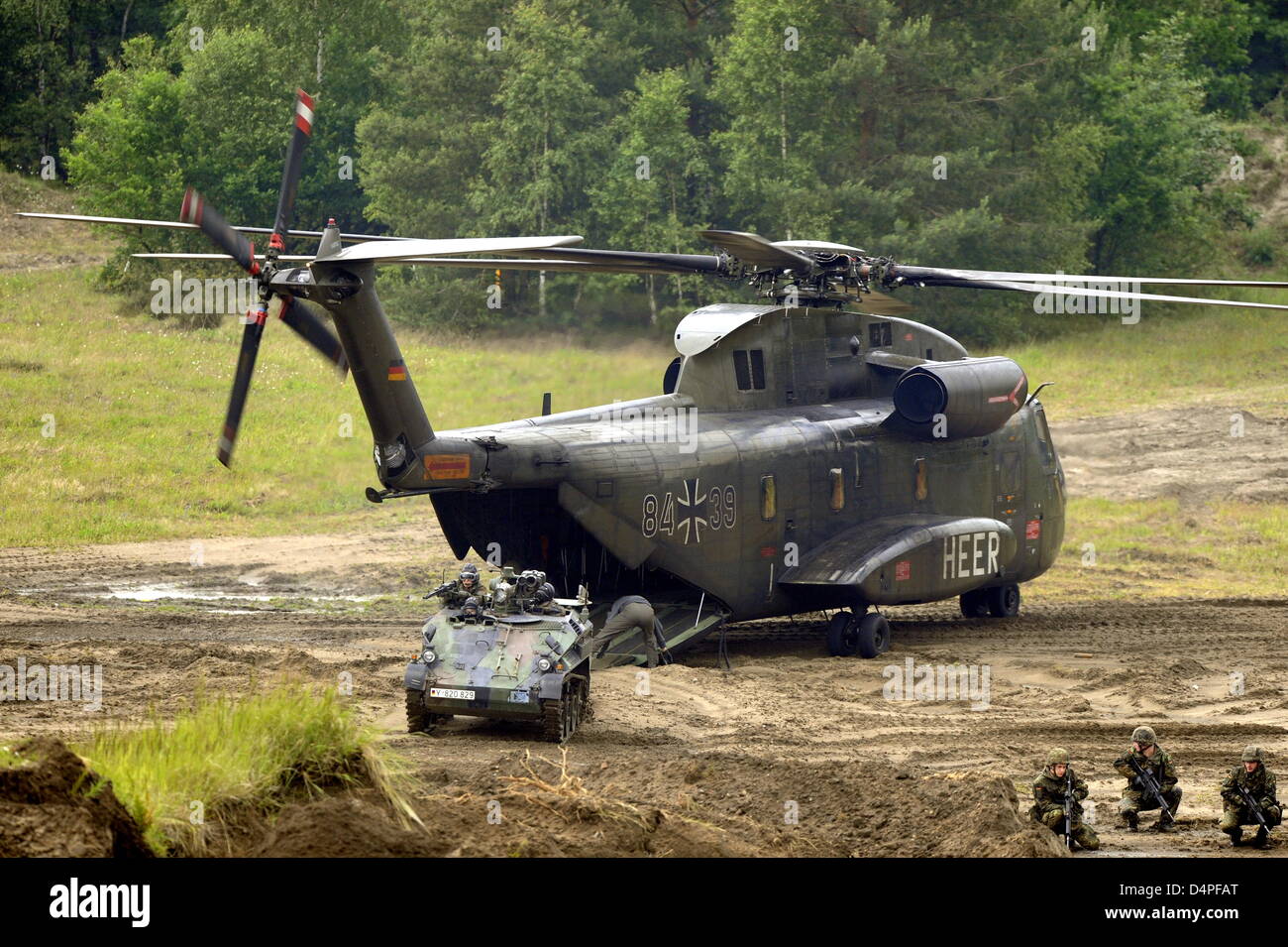 The armoured personnel carrier ?Wiesel? of the Bundeswehr leaves a ...