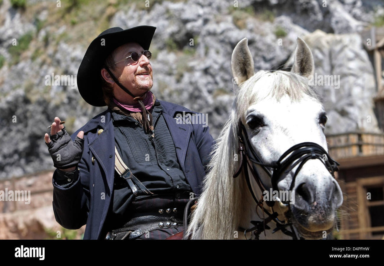 German actor Martin Semmelrogge as Colonel Brinkley rides a horse ...