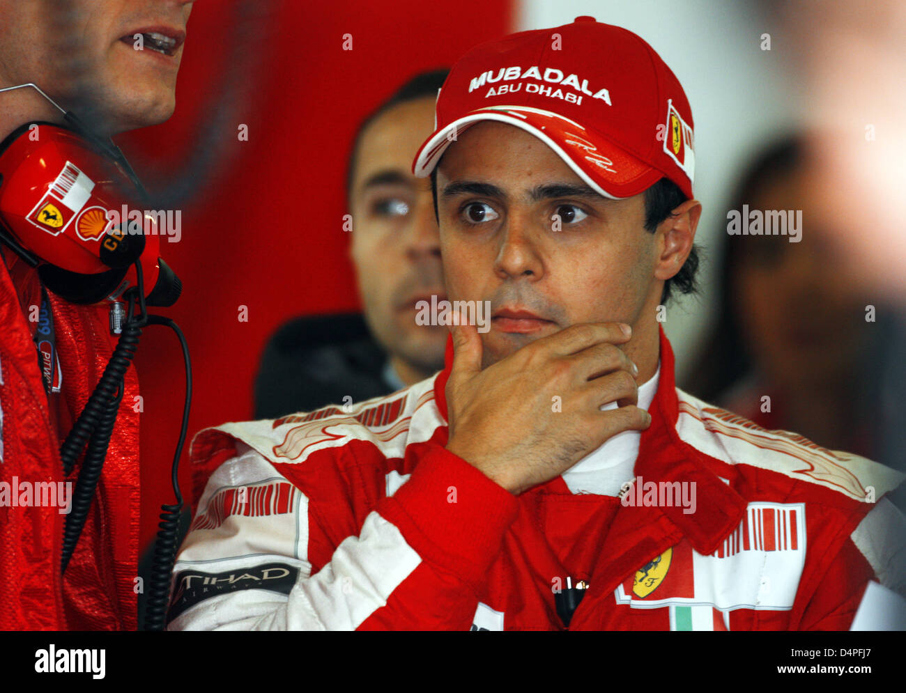 Brazilian Formula One driver Felipe Massa of Scuderia Ferrari grimaces ...