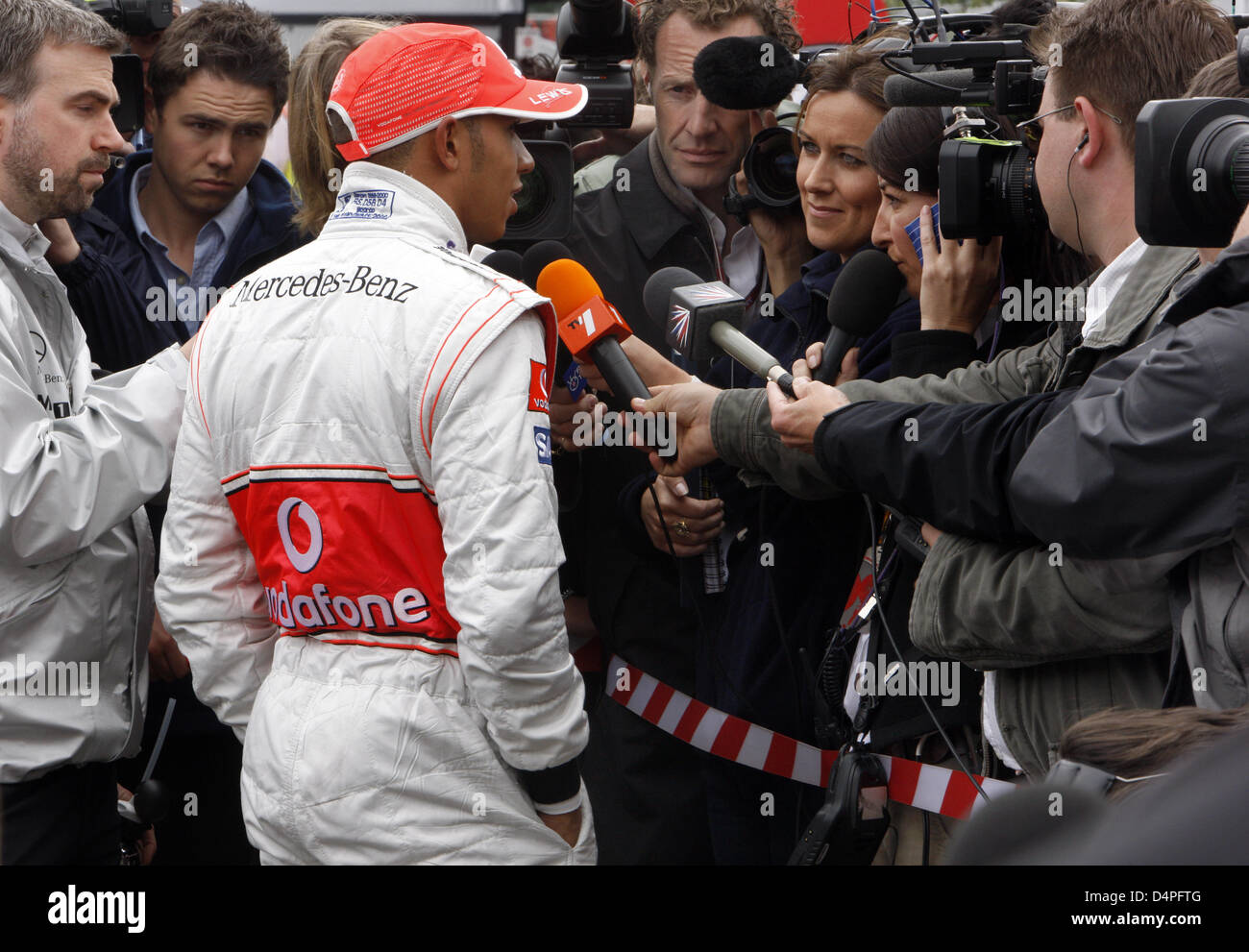 British Formula One driver Lewis Hamilton of McLaren Mercedes gives ...