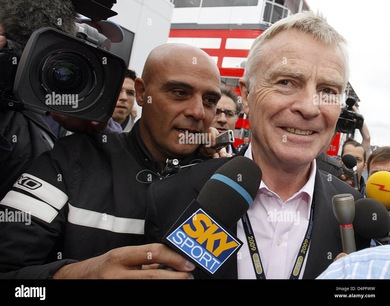 Max Mosley, president of FIA, smiles in the paddock of Silverstone race ...