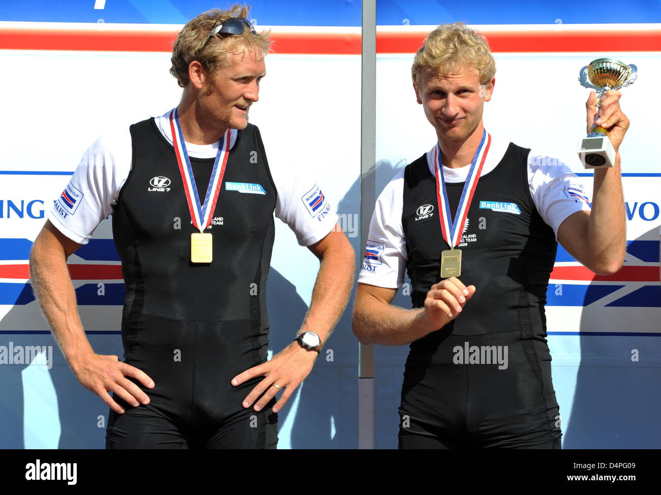 New Zealand?s coxless pair Hamish Bond (R) and Eric Murray (L) cheer ...