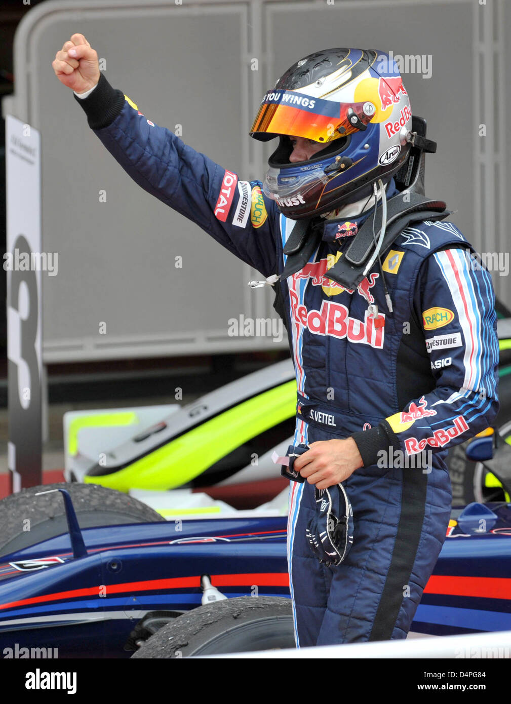 Winner of the race, German Formula One driver Sebastian Vettel (R) of ...