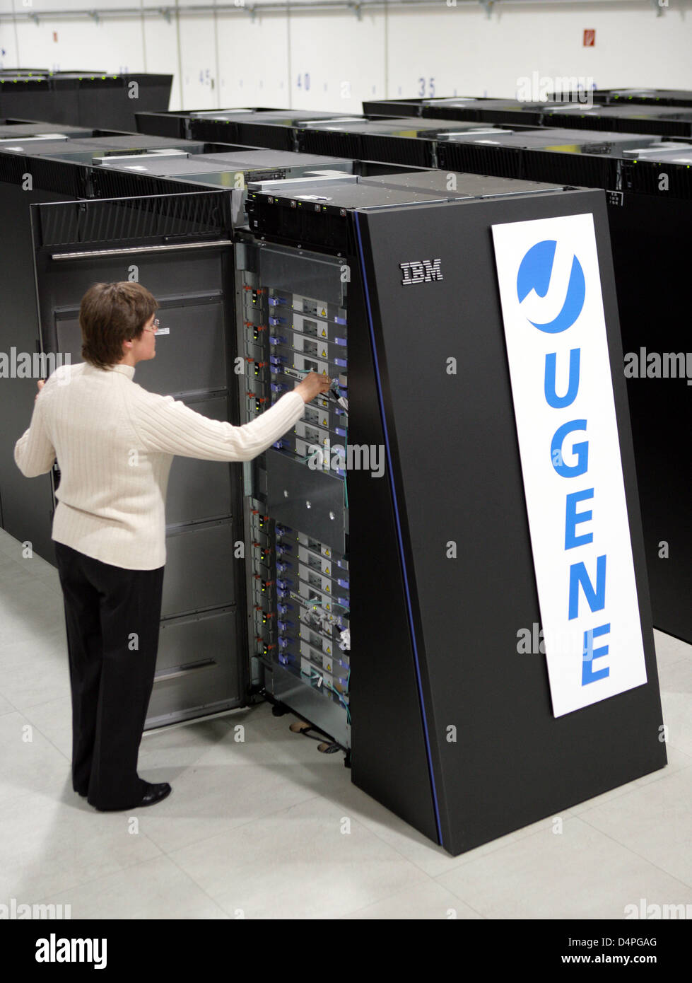 A staff member of research centre Juelich operates supercomputer ...