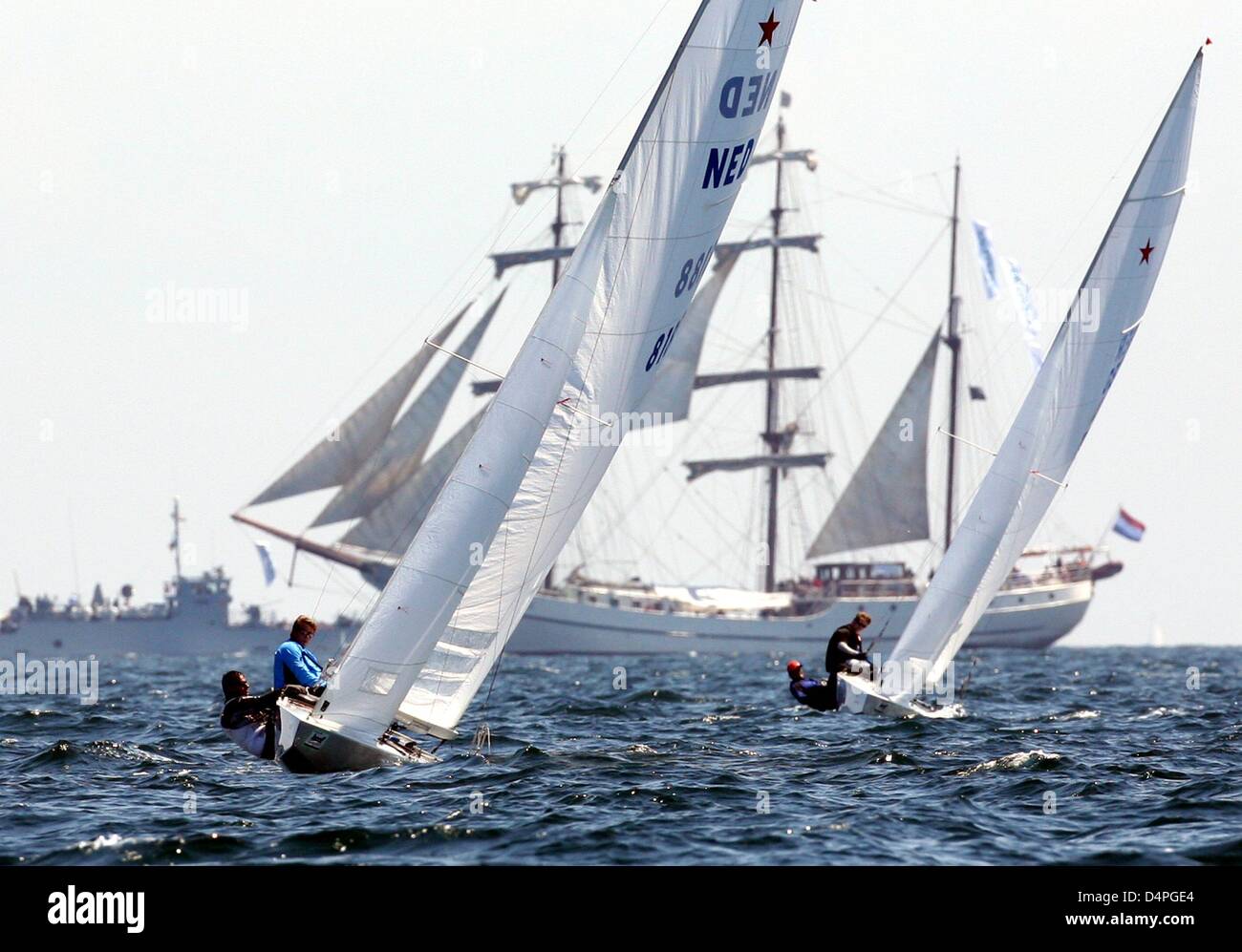 Star boats compete during a regatta at the Kiel Week sailing event on ...