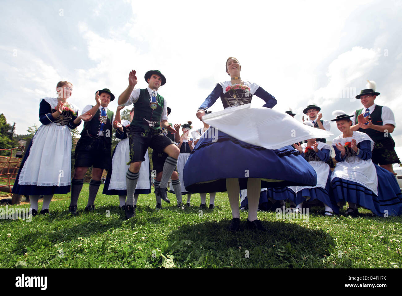 Members of Neufahrn?s Folklore Group (?Trachtenverein?) perform the ...