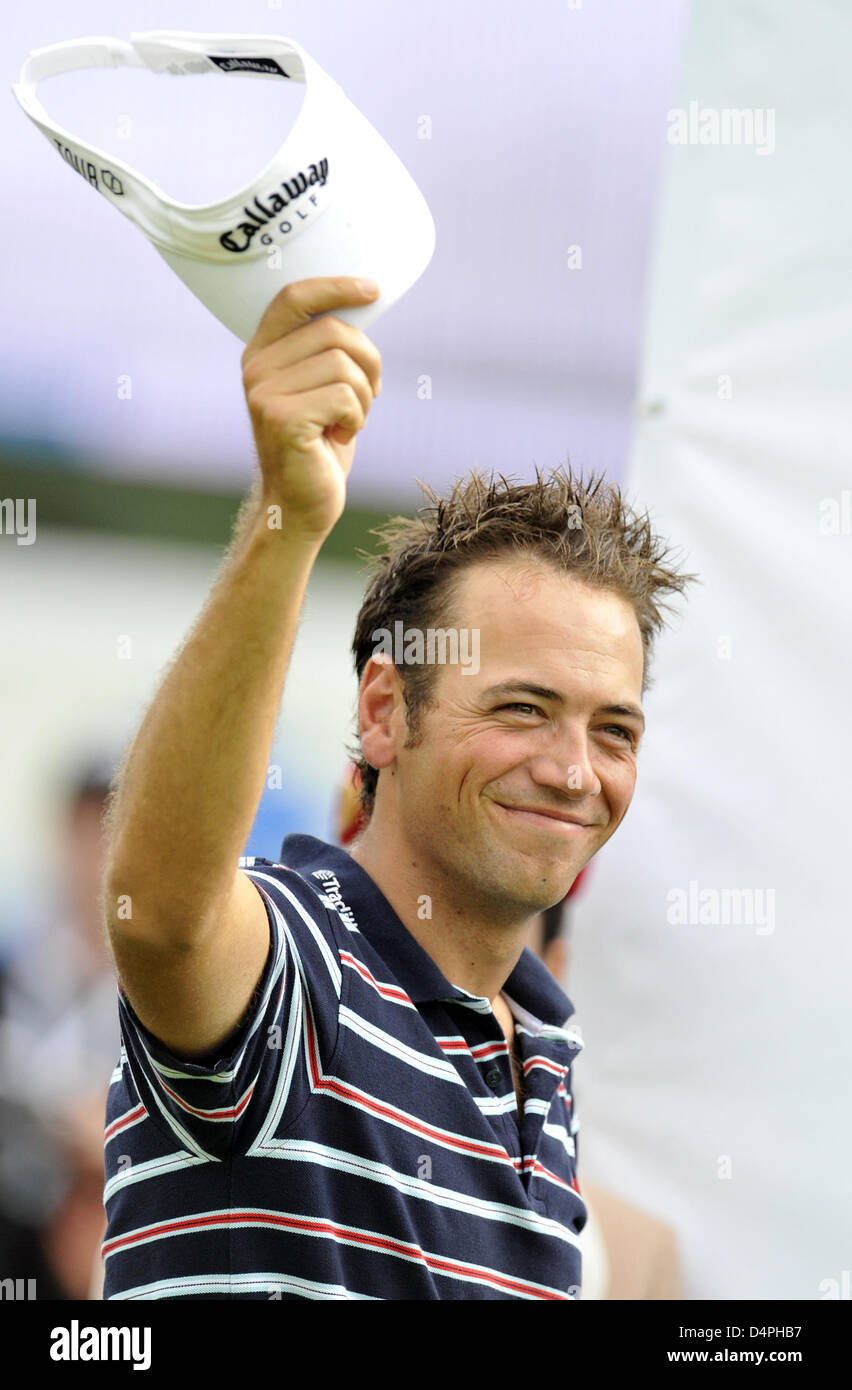 British Nick Dougherty jubilates after winning the final of the BMW ...