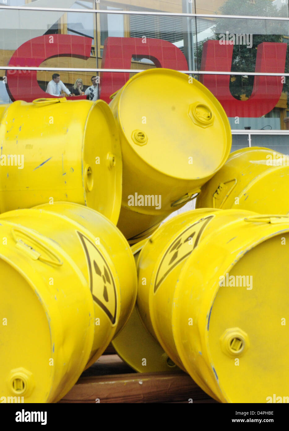 Yellow barrels with warning signs for nuclear waste are pictured in ...