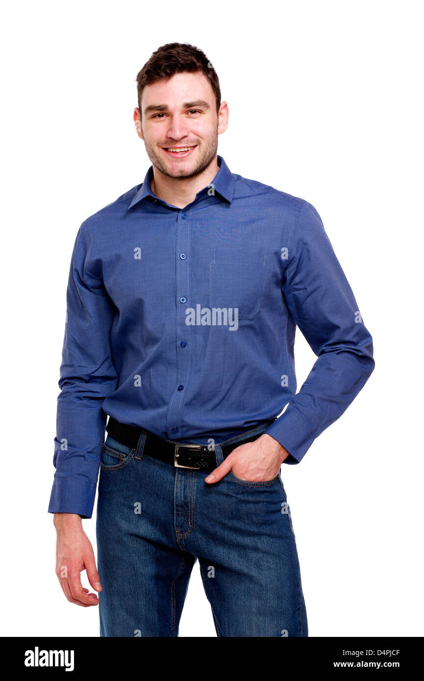 Handsome man wearing a blue shirt and jeans isolated on a white ...