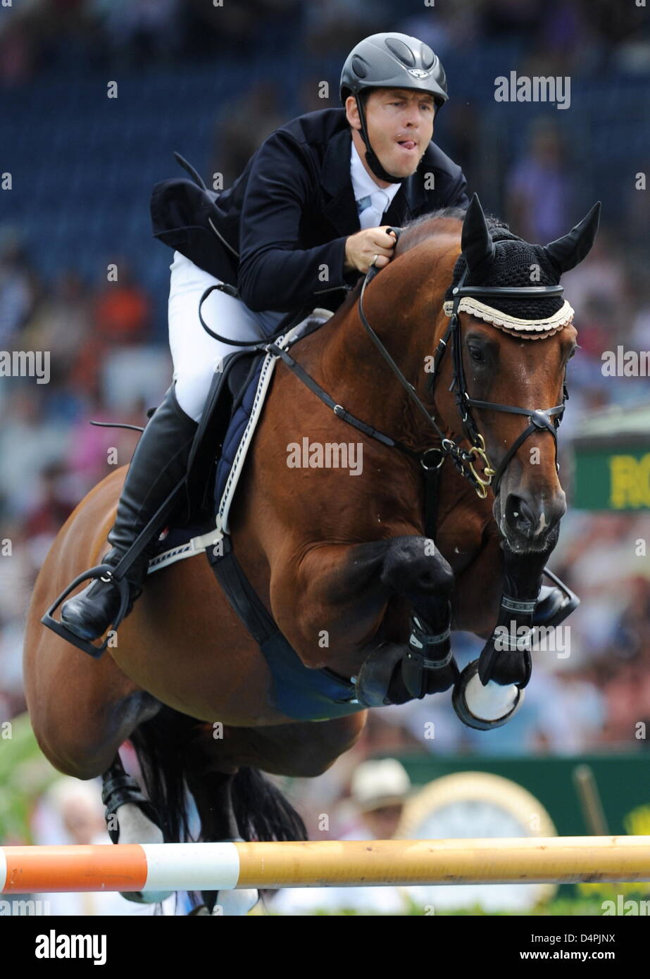 Germany?s jumping equestrian Thomas Muehlbauer and his horse ?Asti ...