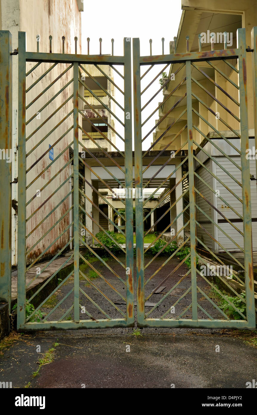 Rusted metal gate at abandoned building Stock Photo - Alamy