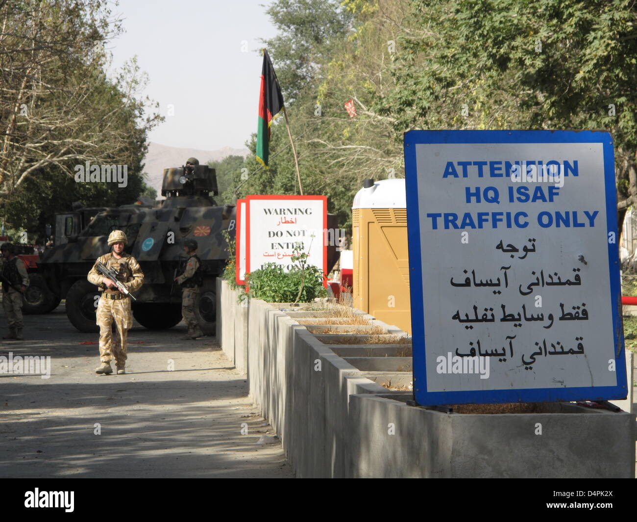 US troops guard the entrance area of the ISAF headquarters in Kabul ...