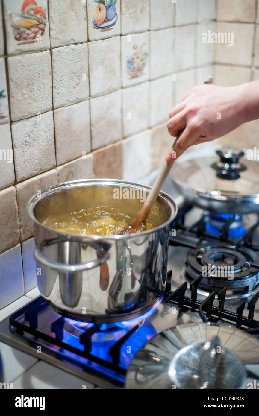 pot with boiling water Stock Photo - Alamy