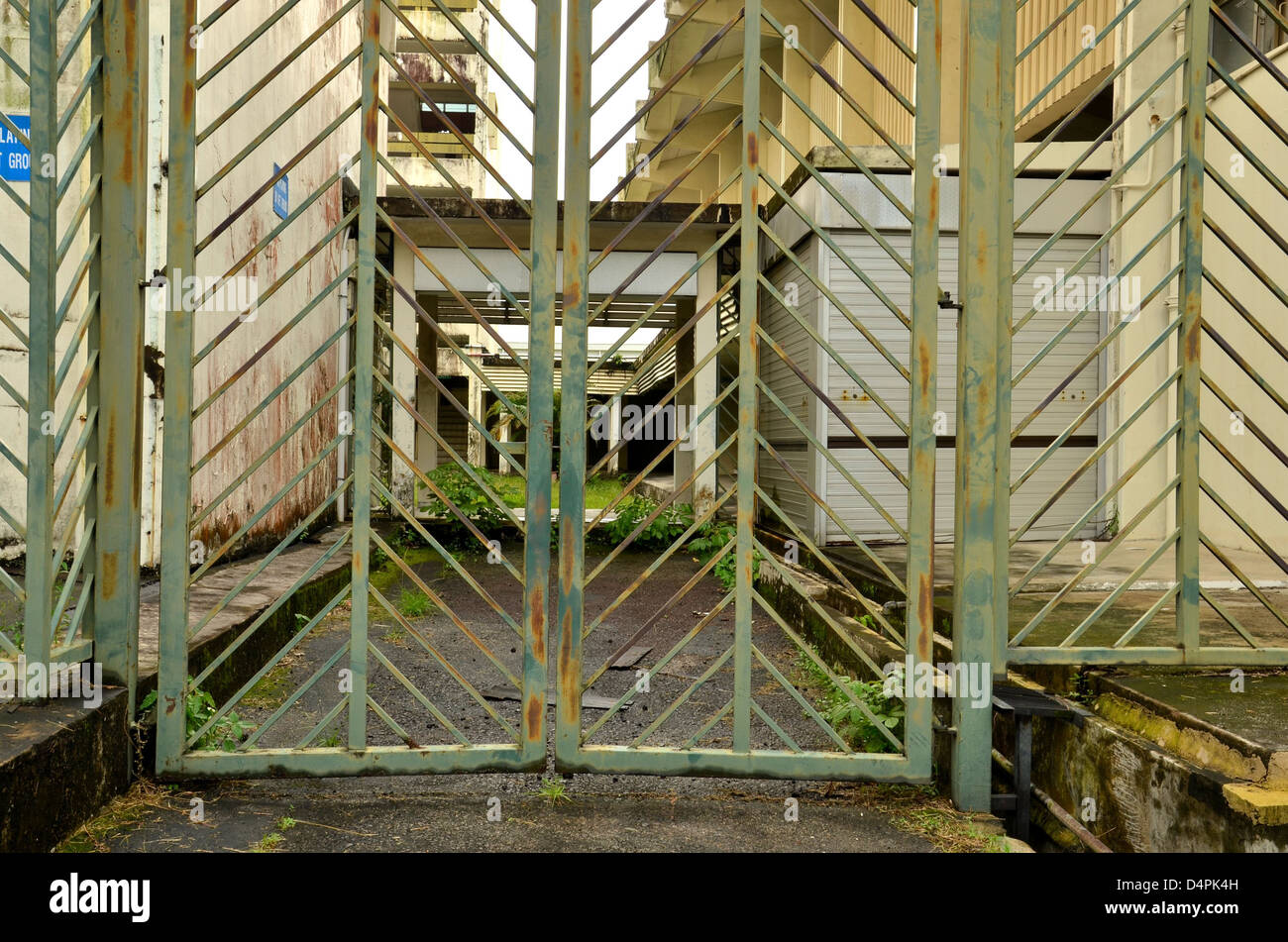 Rusted metal gate at abandoned building Stock Photo - Alamy