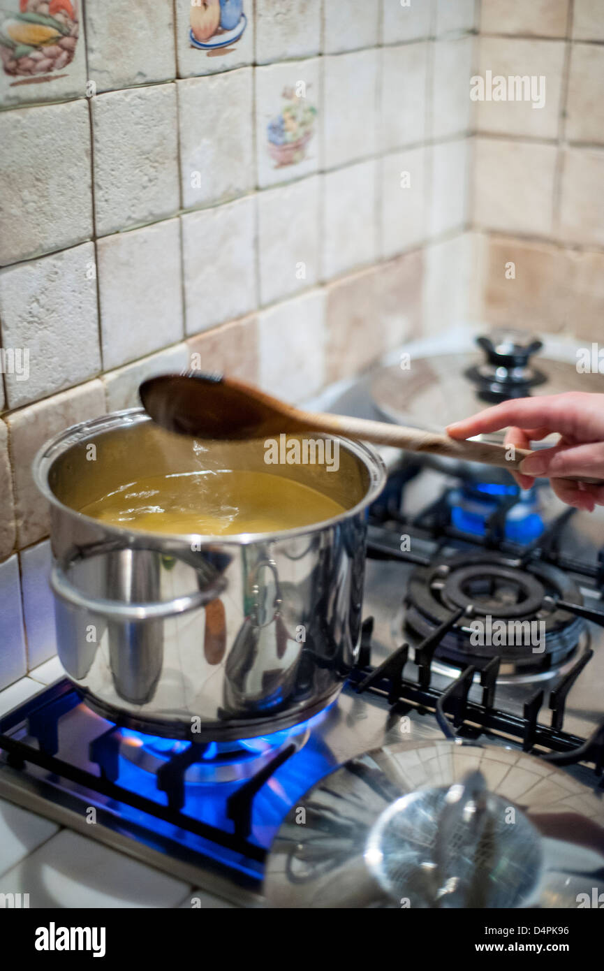 pot with boiling water Stock Photo - Alamy